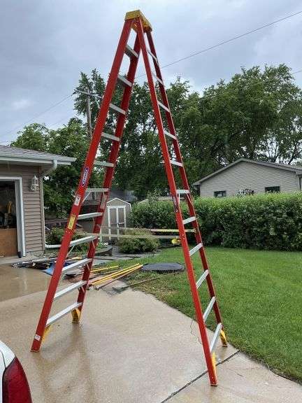Warner 12' step ladder - Legacy Auction Company