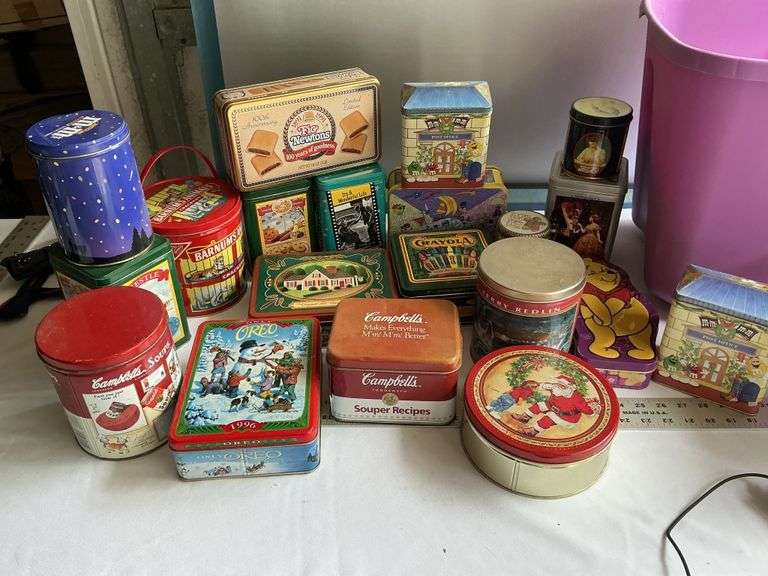 Miscellaneous tins with tote - Legacy Auction Company
