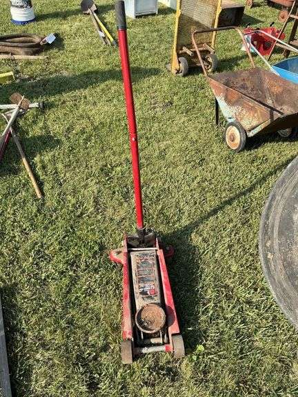 Big red 3 ton jack - Legacy Auction Company