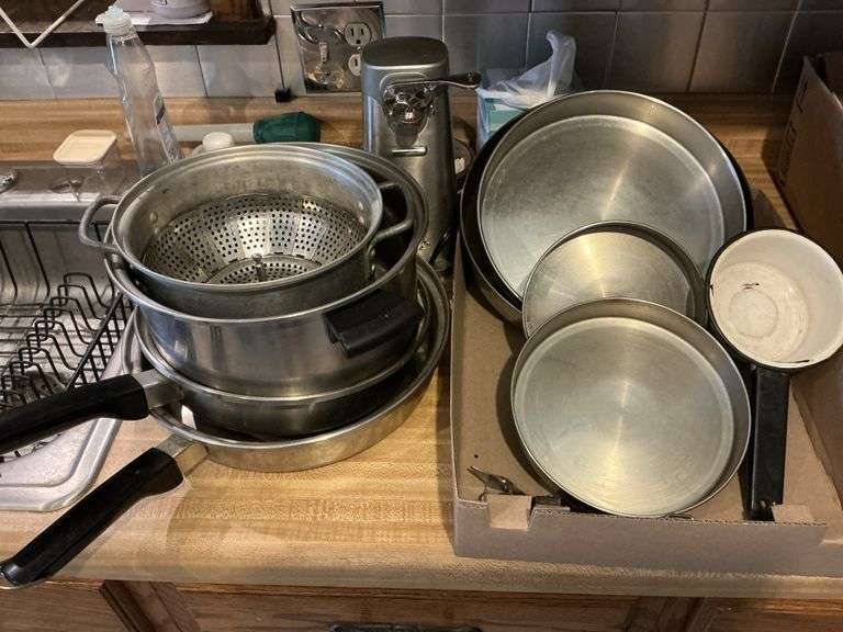 Pans, can opener, etc - Legacy Auction Company