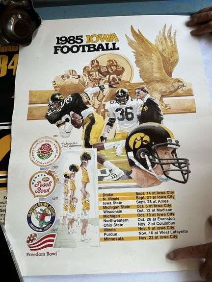 ‘84 & ‘85 Iowa Hawkeyes posters - Legacy Auction Company