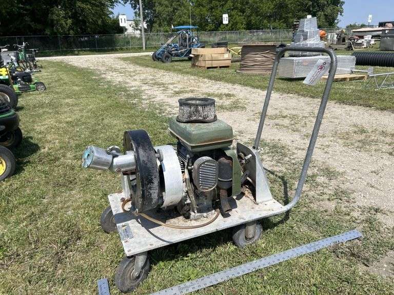 Wisconsin robin micro-gen bug sprayer - Legacy Auction Company