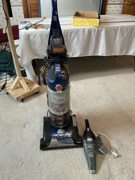 Hoover Windtunnel vacuum cleaner and cordless - Legacy Auction Company