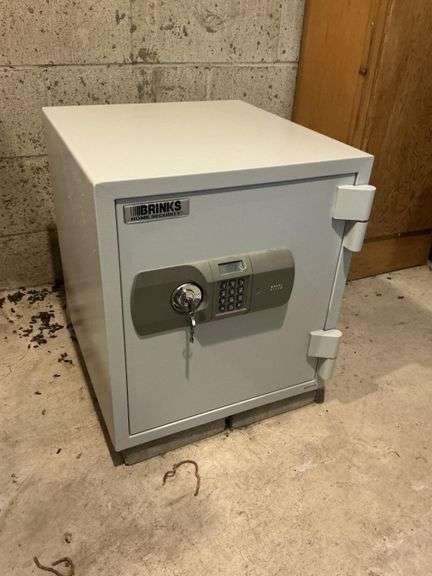 Brinks safe 17" x 18" x 21" buyer removes from - Legacy Auction Company