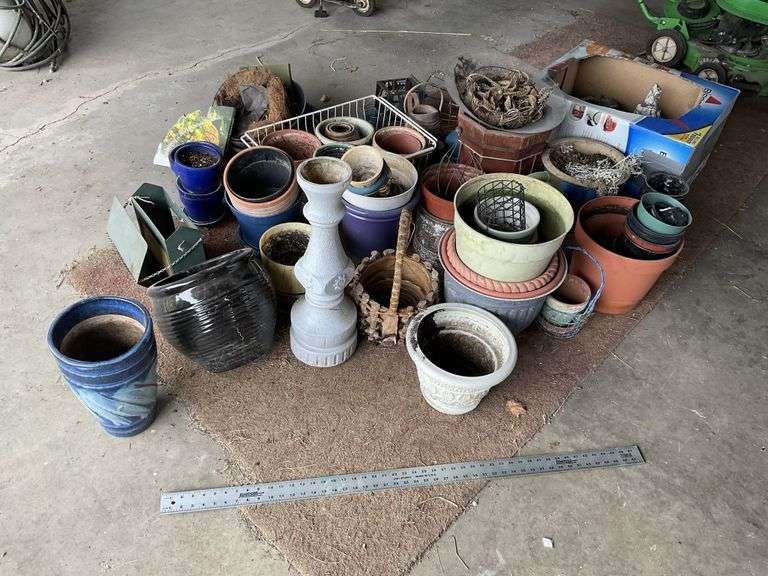 Assorted flower pots and yard decor - Legacy Auction Company
