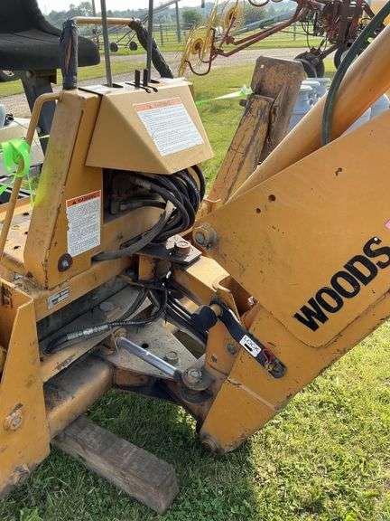Woods 1050 three-point backhoe - Legacy Auction Company