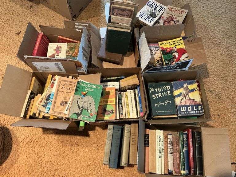8 boxes of books - Legacy Auction Company