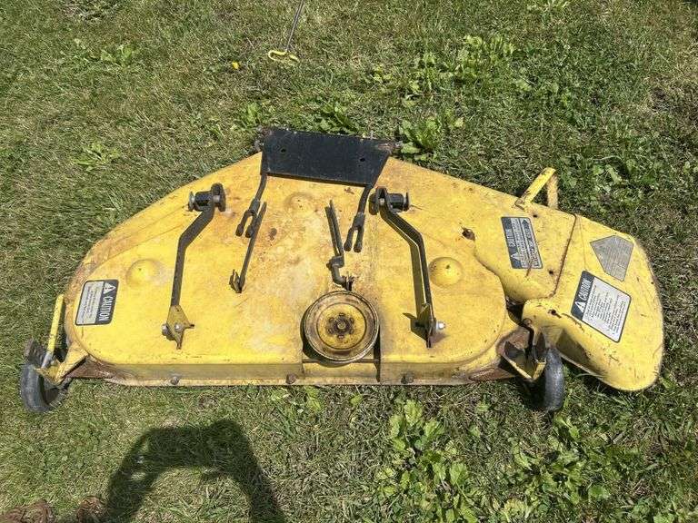 John Deere 110 mower deck - Legacy Auction Company