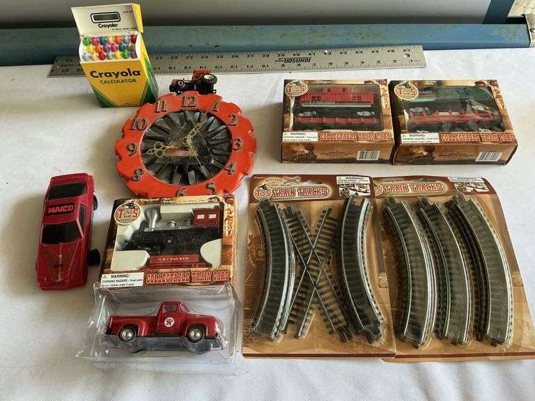 Crayola calculator, train tracks, train cars, - Legacy Auction Company