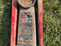 Big red 3 ton jack - Legacy Auction Company