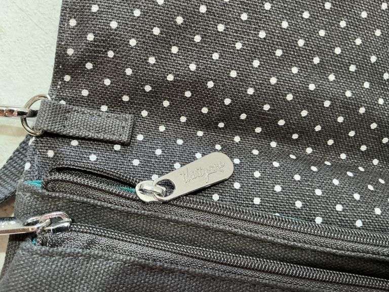 Thirty-one bags and wallets - Legacy Auction Company