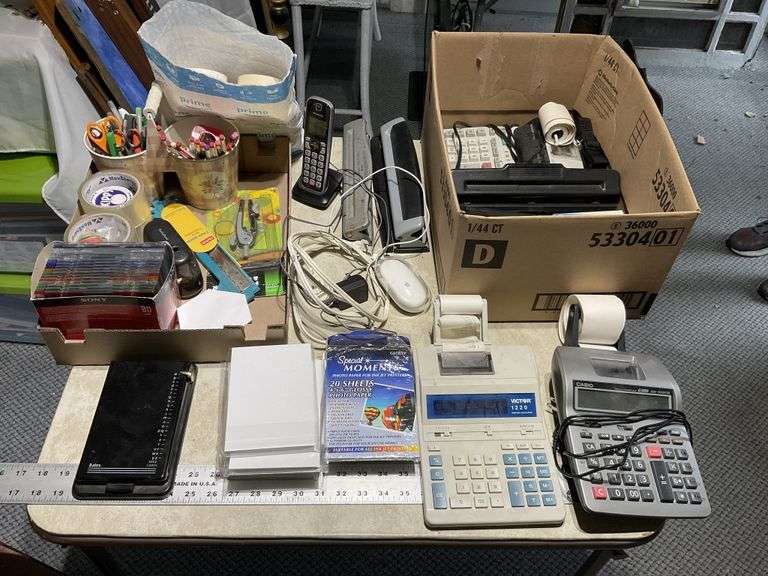 Office supplies, adding machines, glossy photo - Legacy Auction Company