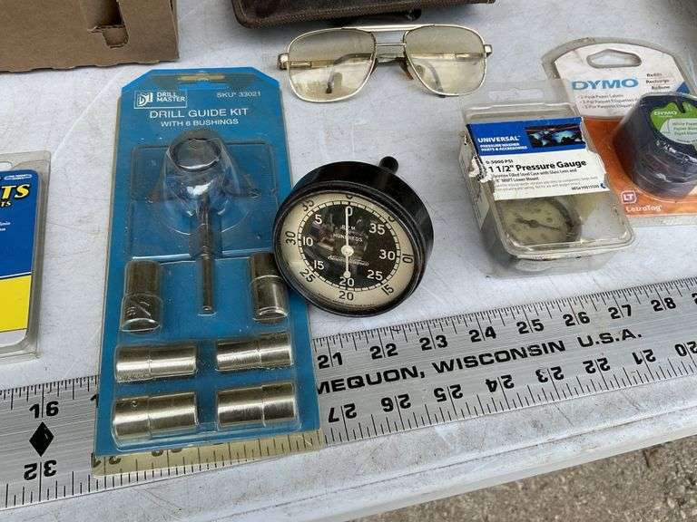 Assorted shop supplies including Stuart Warner - Legacy Auction Company