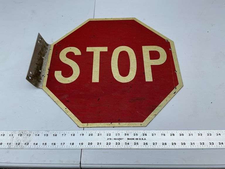 Metal STOP sign - Legacy Auction Company