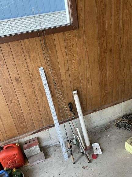 Fishing poles and electric worm getter - Legacy Auction Company