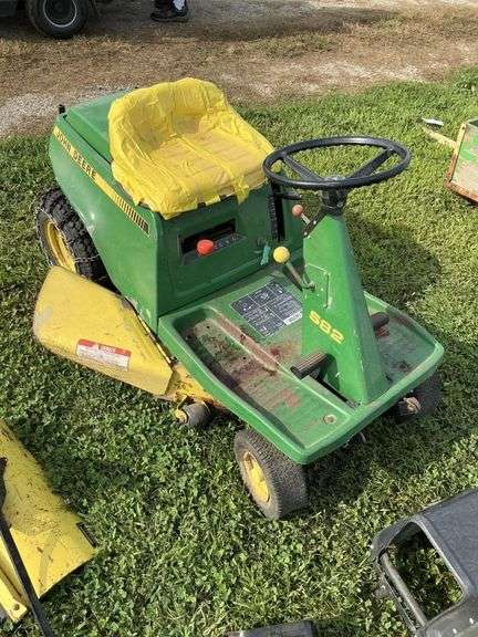 John Deere S82 John Deere riding lawnmower - Legacy Auction Company