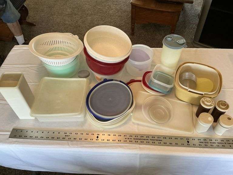 Plastic containers, lids, etc. – some Tupperware - Legacy Auction Company