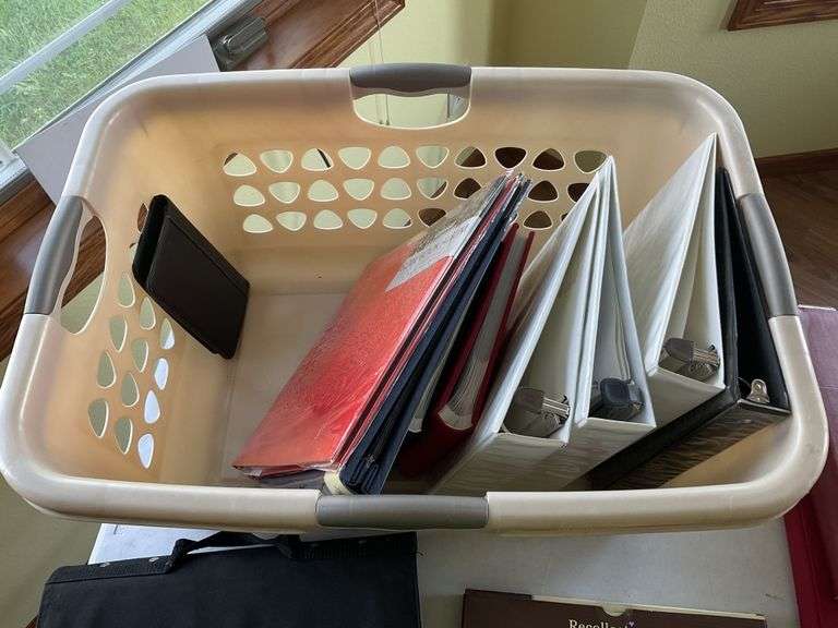 Picture, albums, binders, laundry, basket, etc. - Legacy Auction Company