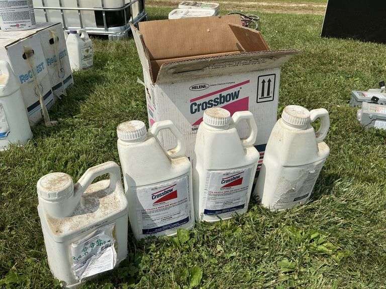 Crossbow and 24D herbicide, all jugs are full. - Legacy Auction Company