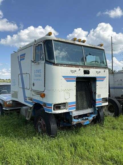 Peterbilt 362 cab over semi, no engine! - Legacy Auction Company