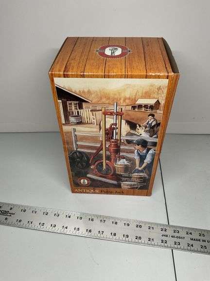 Antique pump jack - Legacy Auction Company