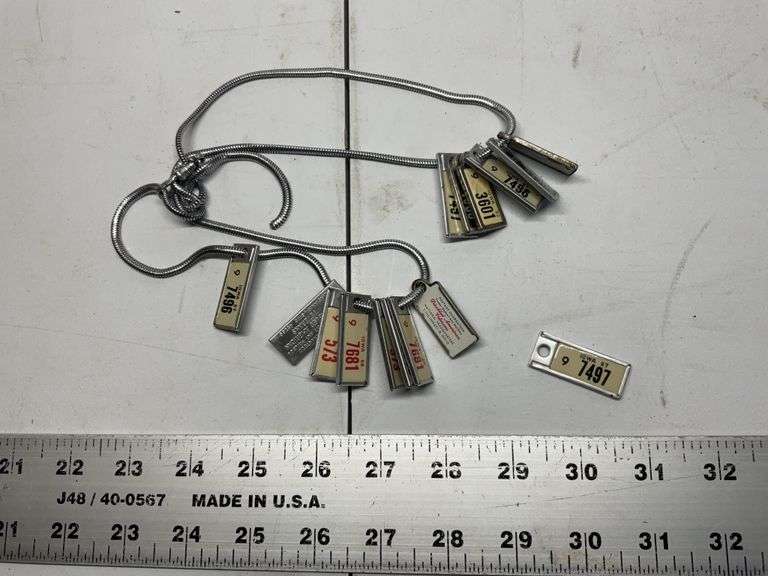 Vintage mini license plates - Legacy Auction Company