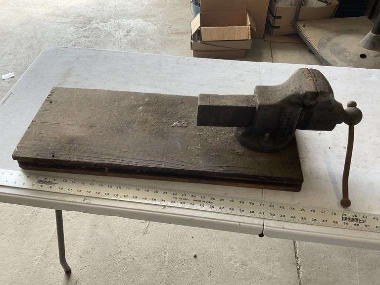 Yost 4" bench vise on board - Legacy Auction Company