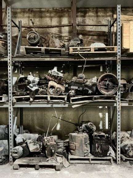 Transmissions and contents of three shelves. - Legacy Auction Company