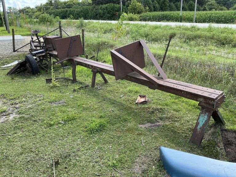 Road grader and frame/scrap metal - Legacy Auction Company