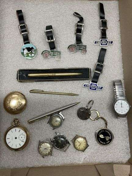Watches, watch fobs and pens - Legacy Auction Company