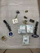 Assorted watch fobs and pins, some Ford - Legacy Auction Company