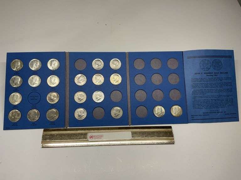 Kennedy half dollar book starting 1964 with coins - Legacy Auction Company