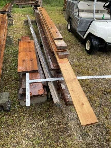 Assorted lumber. Up to 16’ long. - Legacy Auction Company