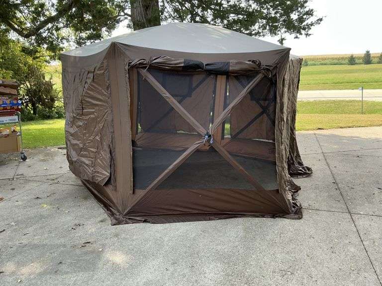 "CLAM" pop-up tent/shelter - Legacy Auction Company