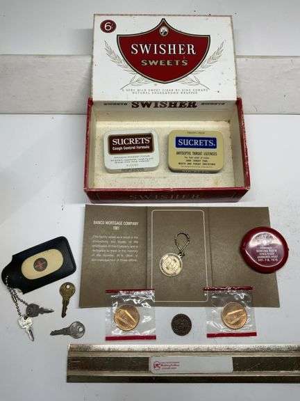 Cigar box with medallions, keychains etc. - Legacy Auction Company