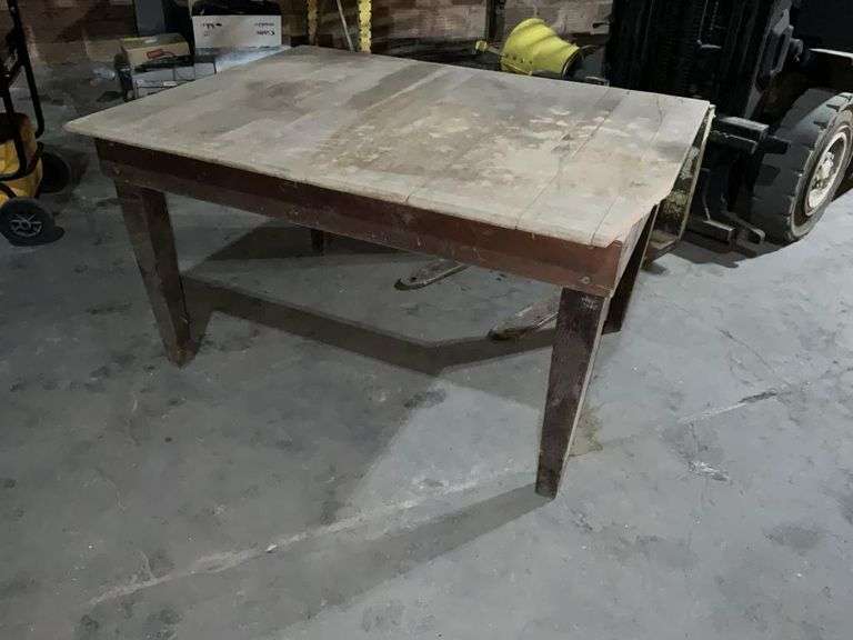 Primitive wooden table, 55" x 42" x 30" - Legacy Auction Company