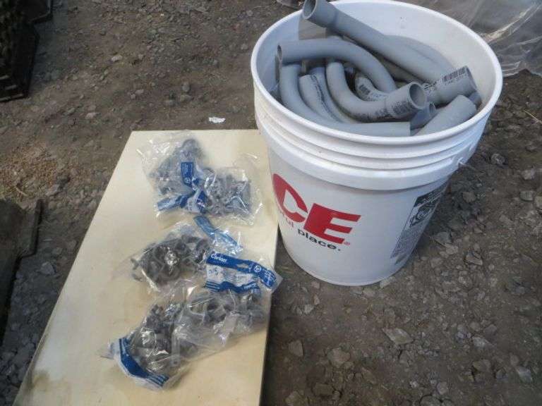 Pail of 3/4" PVC Sweeps & Hangers - Lambrecht Auction, Inc.