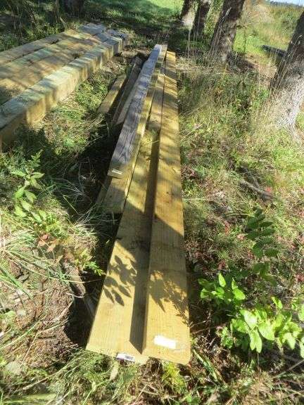 Pile of Misc. Pressure Treated Lumber - Lambrecht Auction, Inc.
