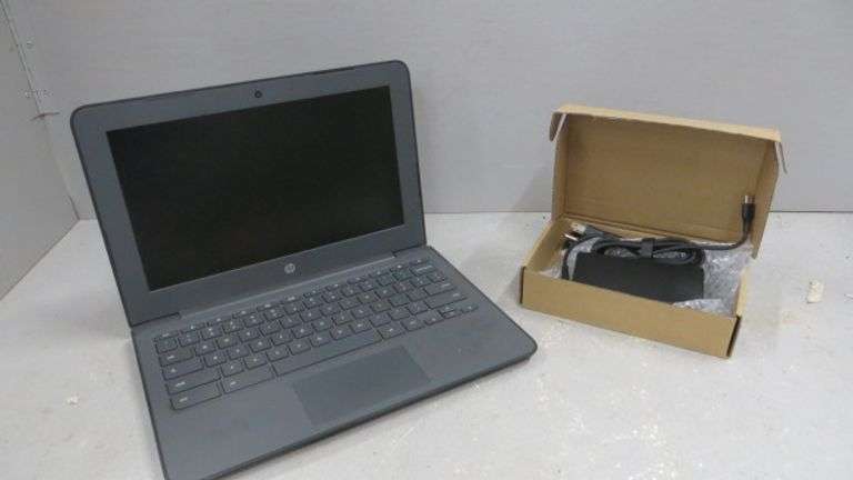 HP Chrome Book - Lambrecht Auction, Inc.