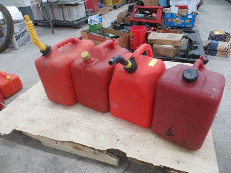 Four 5-Gallon Gas Cans - Lambrecht Auction, Inc.