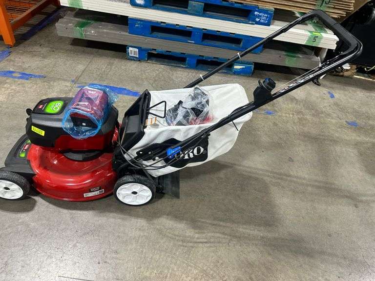 Toro 60V 21" SMARTSTOW® Self-Propel Mower - Lambrecht Auction, Inc.
