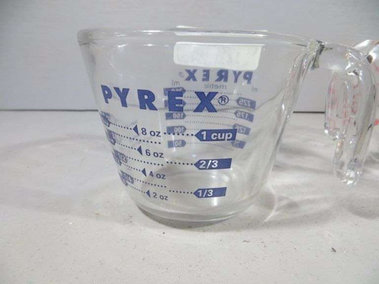 Three Pyrex Measuring Cups - Lambrecht Auction, Inc.