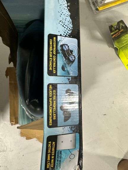 Bass Pro Shops Remote Control Trick Shark Boat - Lambrecht Auction, Inc.