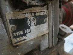 Wisconsin 2 Cylinder Gas Engine - Lambrecht Auction, Inc.