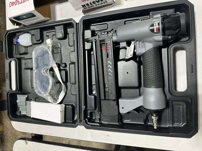 Neumaster Nail Gun - Lambrecht Auction, Inc.