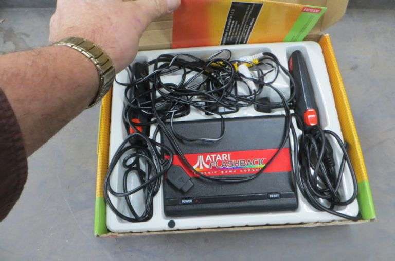 Atari Game Console - Lambrecht Auction, Inc.