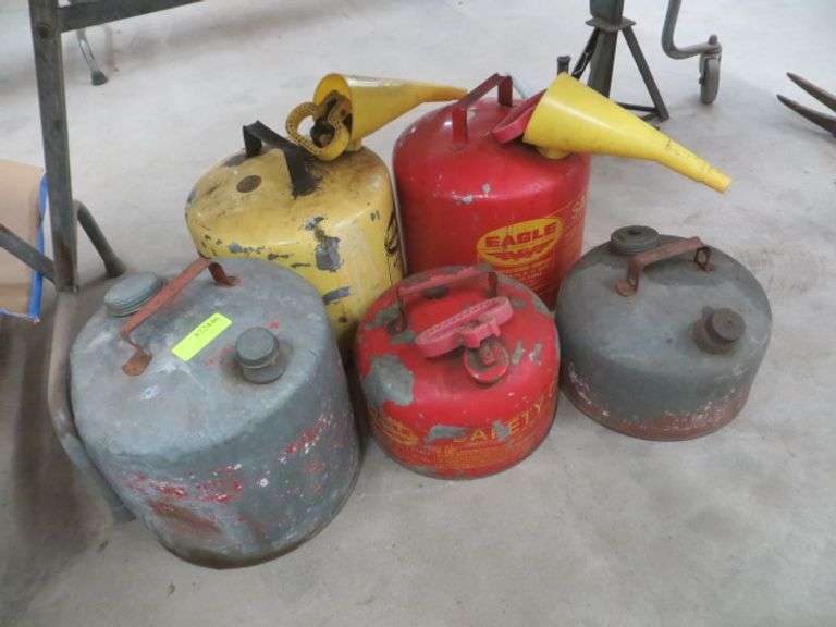 Five Assorted Metal Fuel Cans - Lambrecht Auction, Inc.