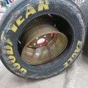 Three Goodyear Drag Slicks w/Rims 25.5x14.0-16 - Lambrecht Auction, Inc.