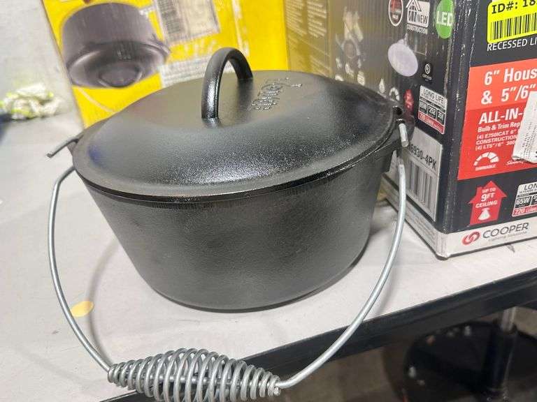Lodge 5 qt. Cast Iron Dutch Oven with Lid and Spiral Bail Handle - Lambrecht Auction, Inc.