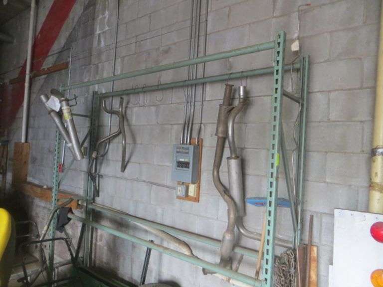 Rack Used for Exhaust Pipes - Lambrecht Auction, Inc.